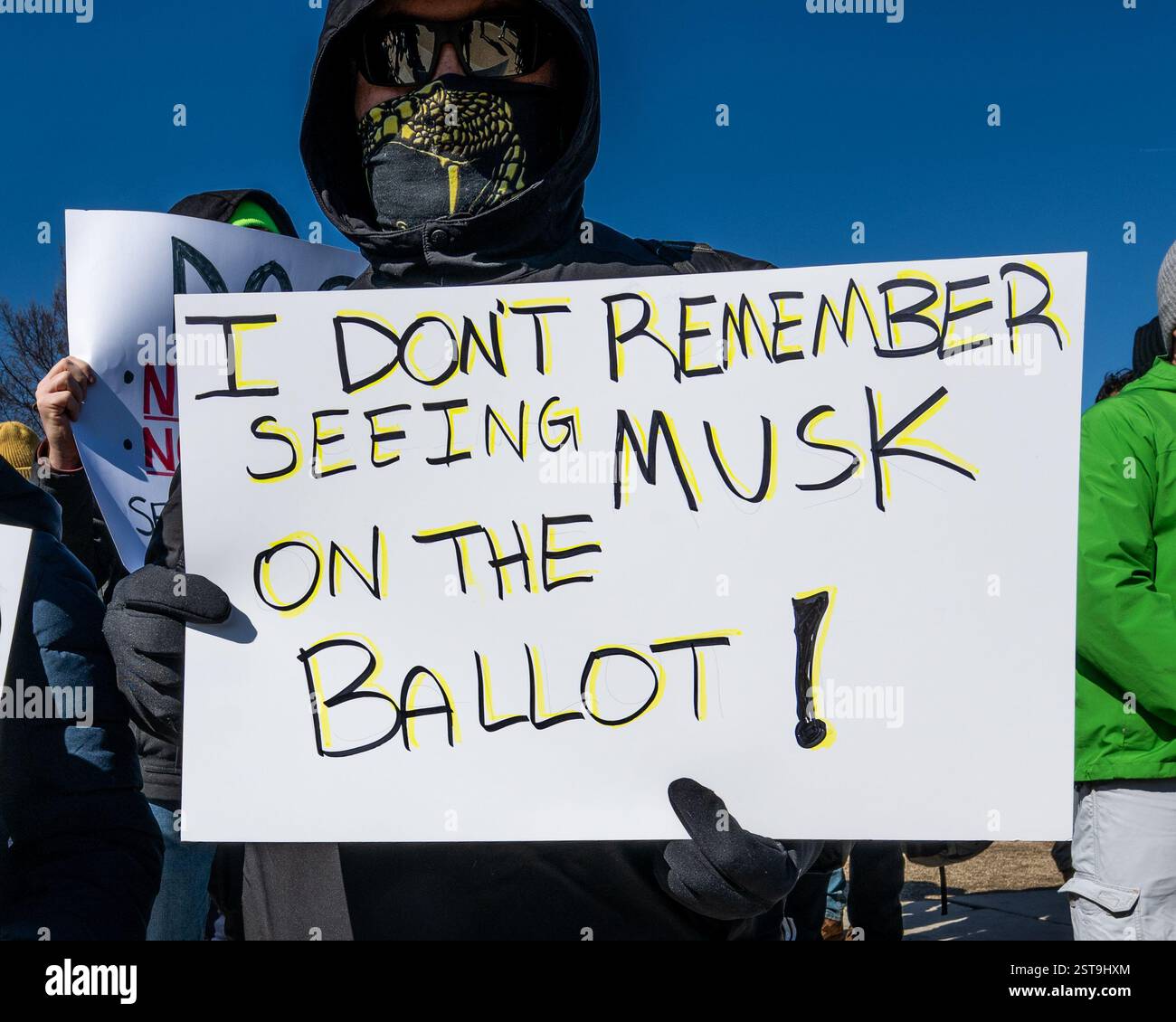 Washington, United States. 17th Feb, 2025. A protester holds a placard ...
