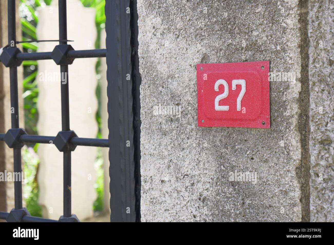Iron gate with signage hi-res stock photography and images - Alamy
