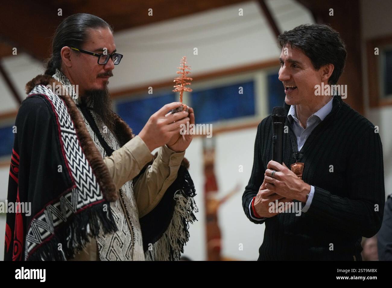 Prime Minister Justin Trudeau presents Haida Nation President Gaagwiis ...