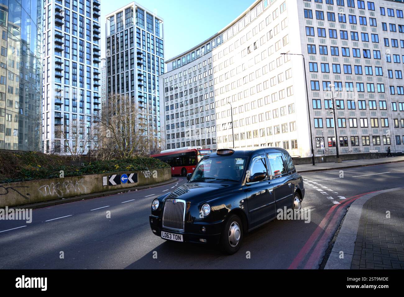London, UK. January 31st 2025. A typical London black cab driving near ...