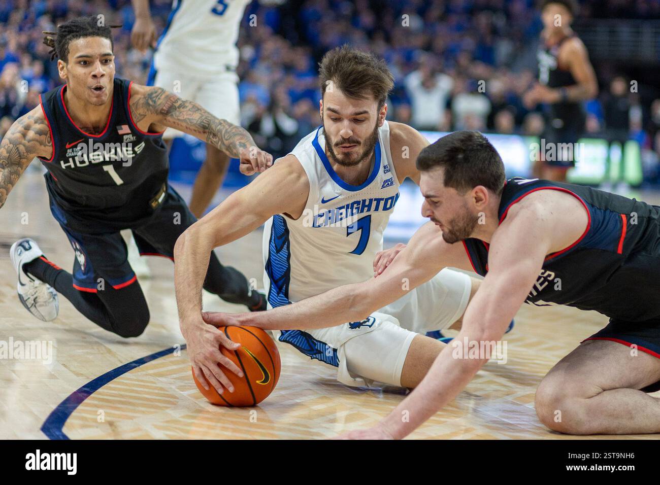 Omaha, NE. U.S. 11th Feb, 2025. - Connecticut Huskies guard Solo Ball ...