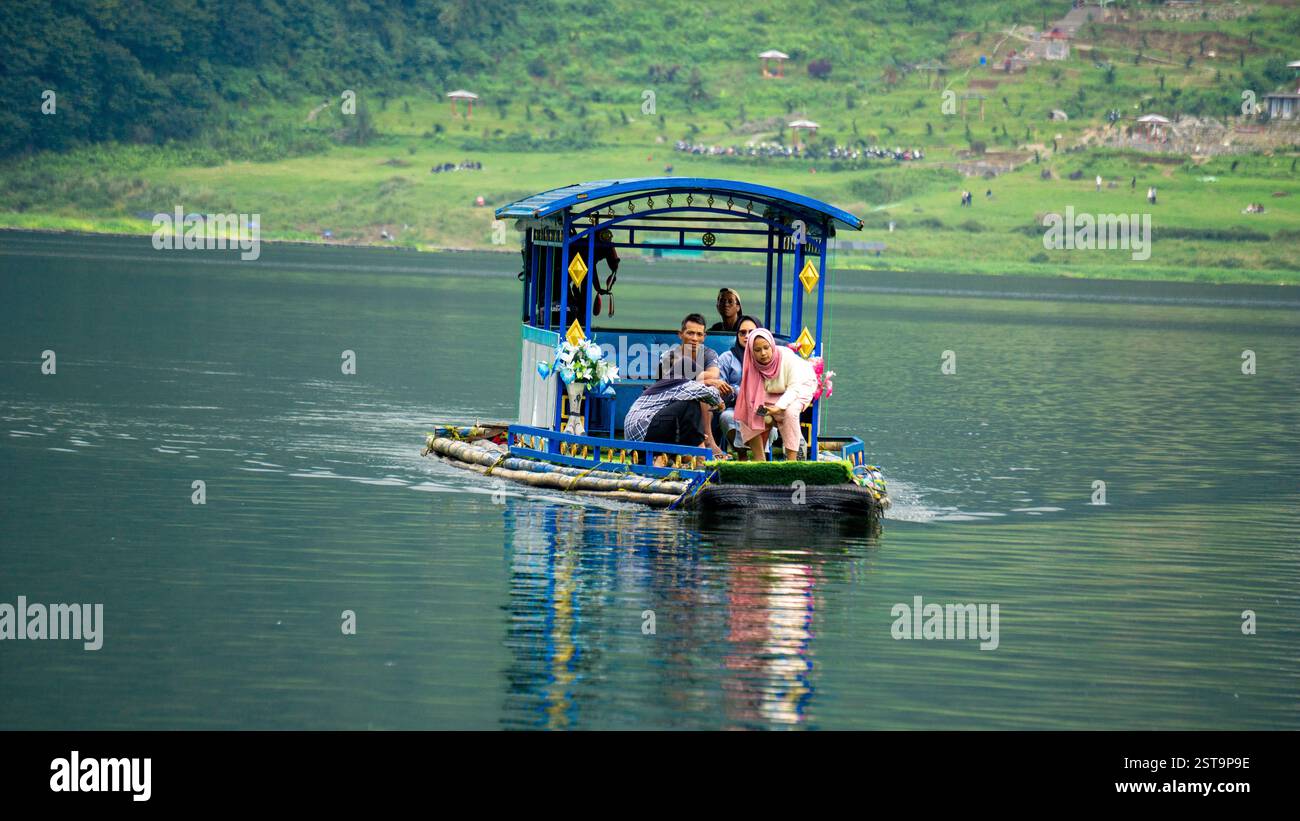 The athmosphere at Telaga Menjer (Menjer Lake) on holiday. Telaga ...