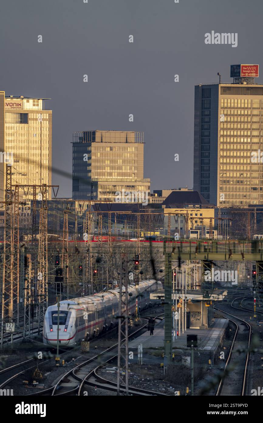 ICE train on the tracks west of Essen central station, skyline of the ...