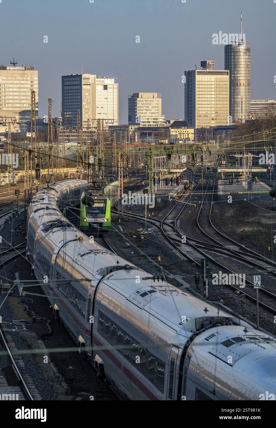 ICE train on the tracks west of Essen central station, skyline of the ...