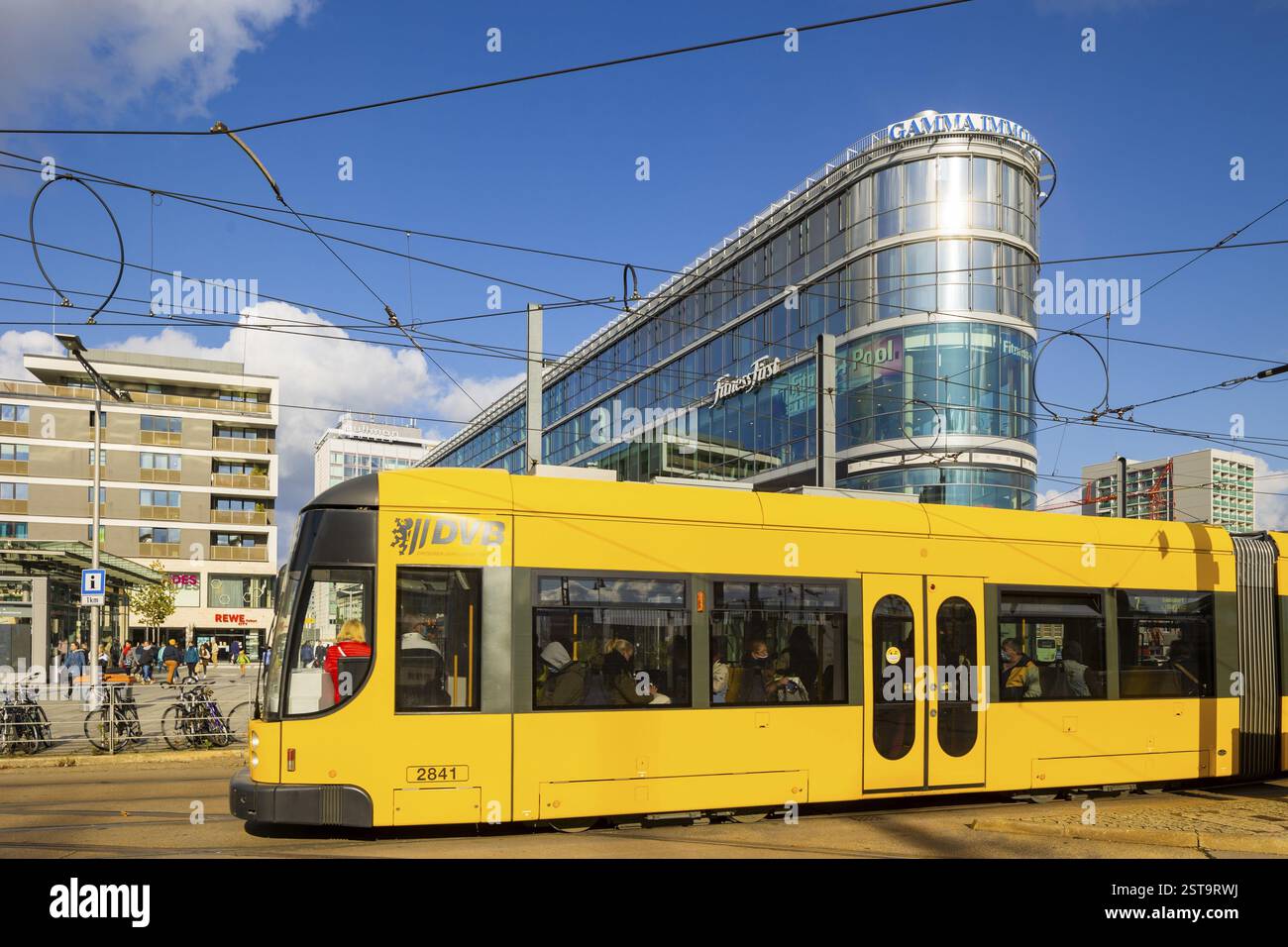 Yellow tram train of the DVB in the city centre of Dresden. at the main ...