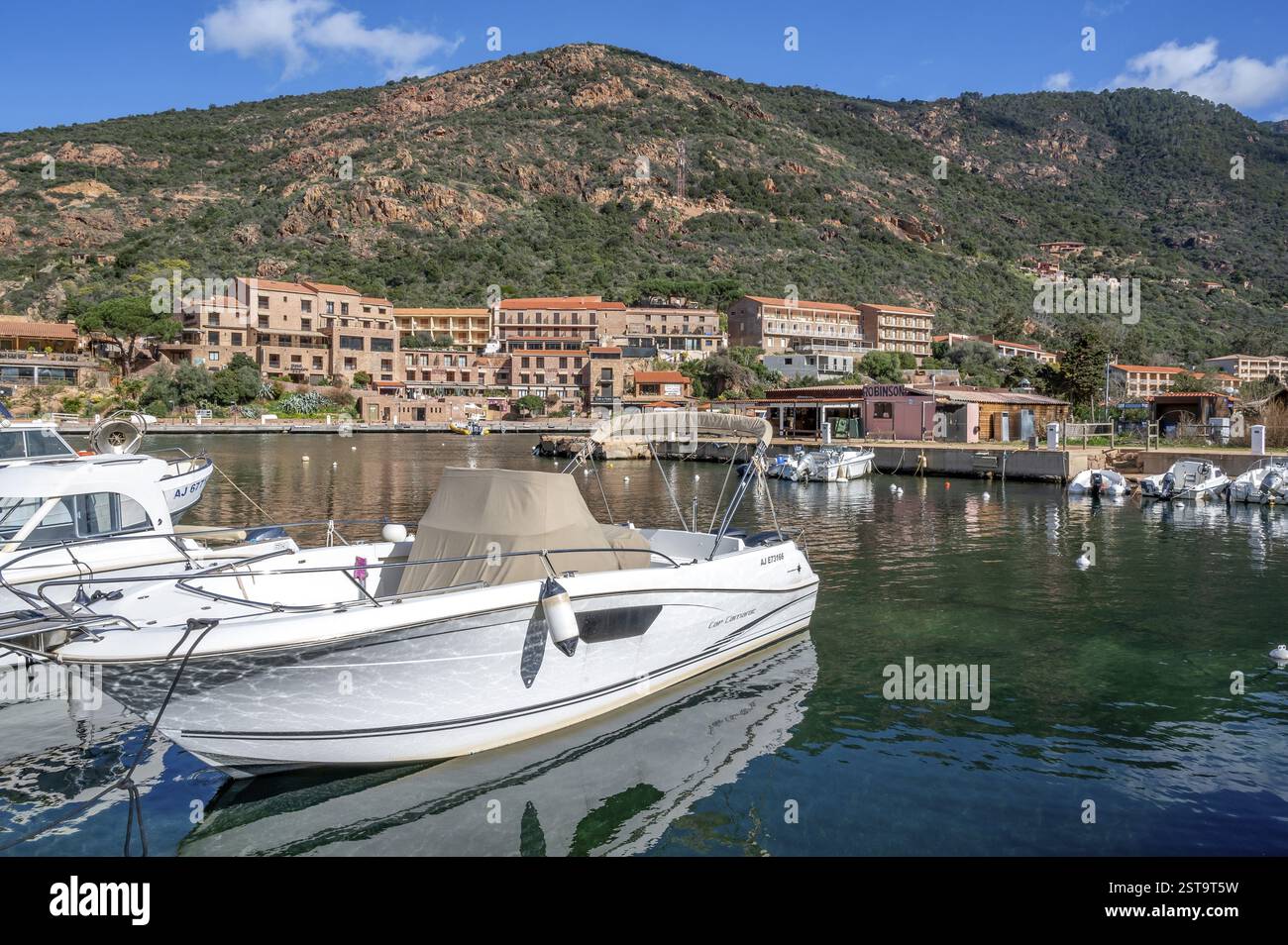 The harbour of Porto-Marina with the Genoese Tower (Tour Genoise de ...
