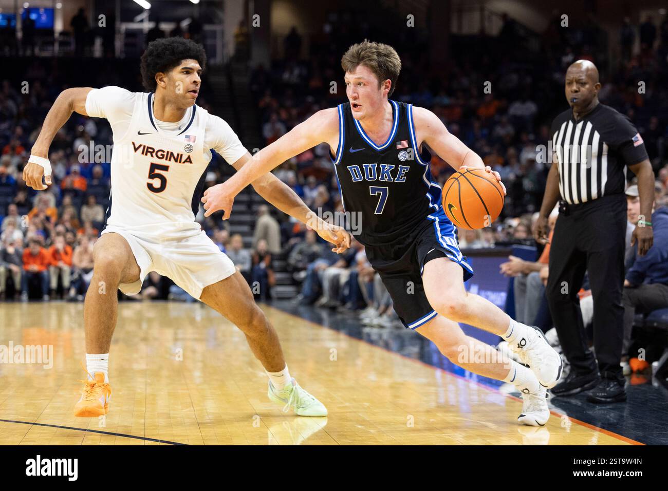 Duke guard Kon Knueppel (7) defends the ball from Virginia forward ...