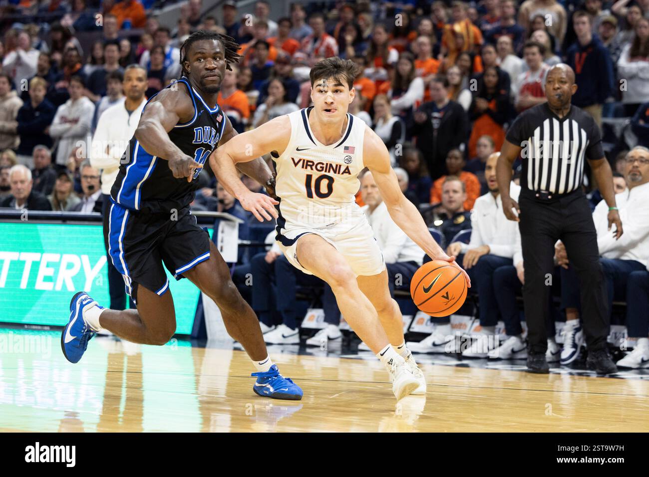 Virginia guard Taine Murray (10) defends the ball from Duke guard Sion ...