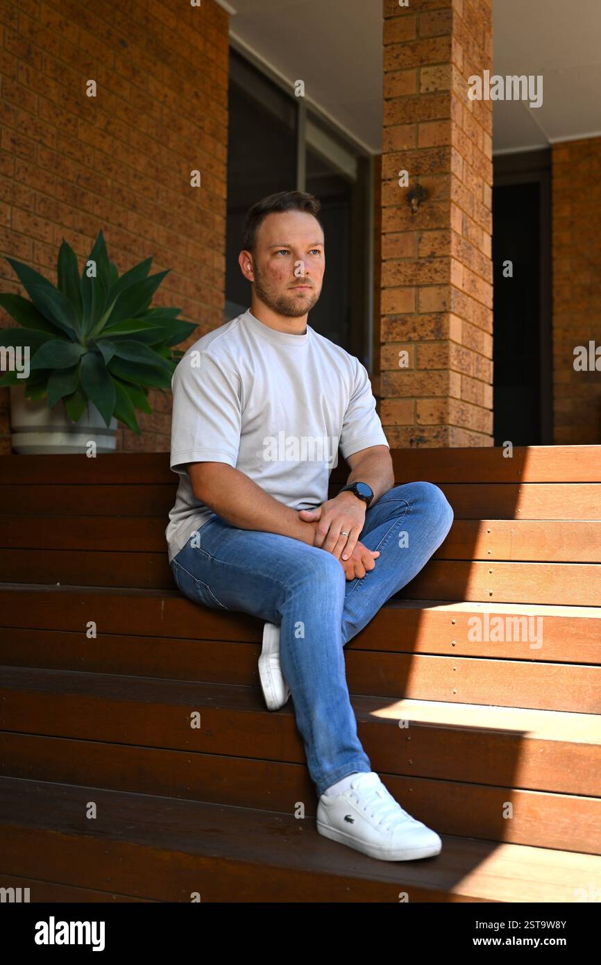 Canberra, Australia. 18th Feb, 2025. Homeowner Timon Howes poses for a ...