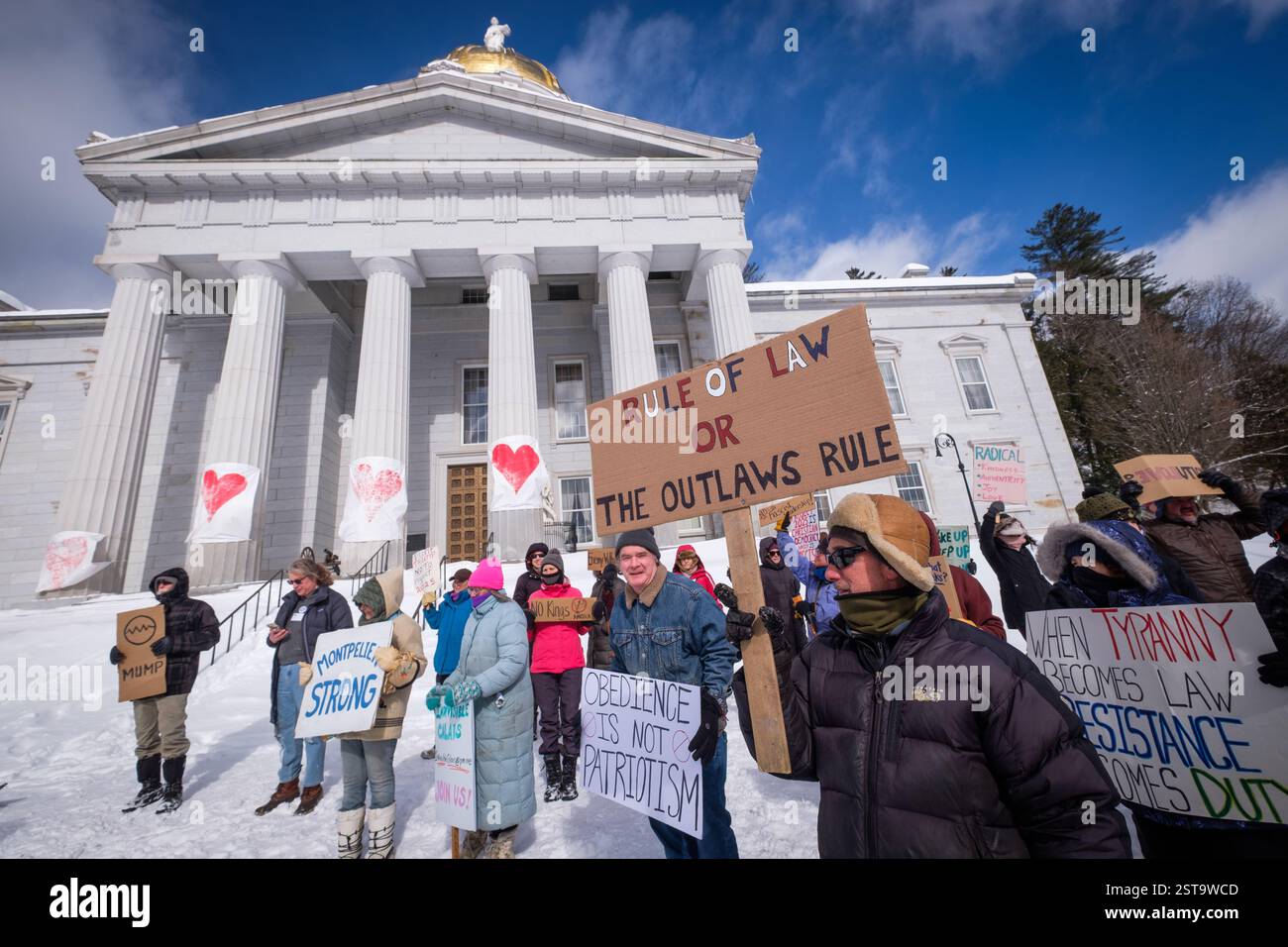Demonstrators protest Trump administration policies during the Vermont ...