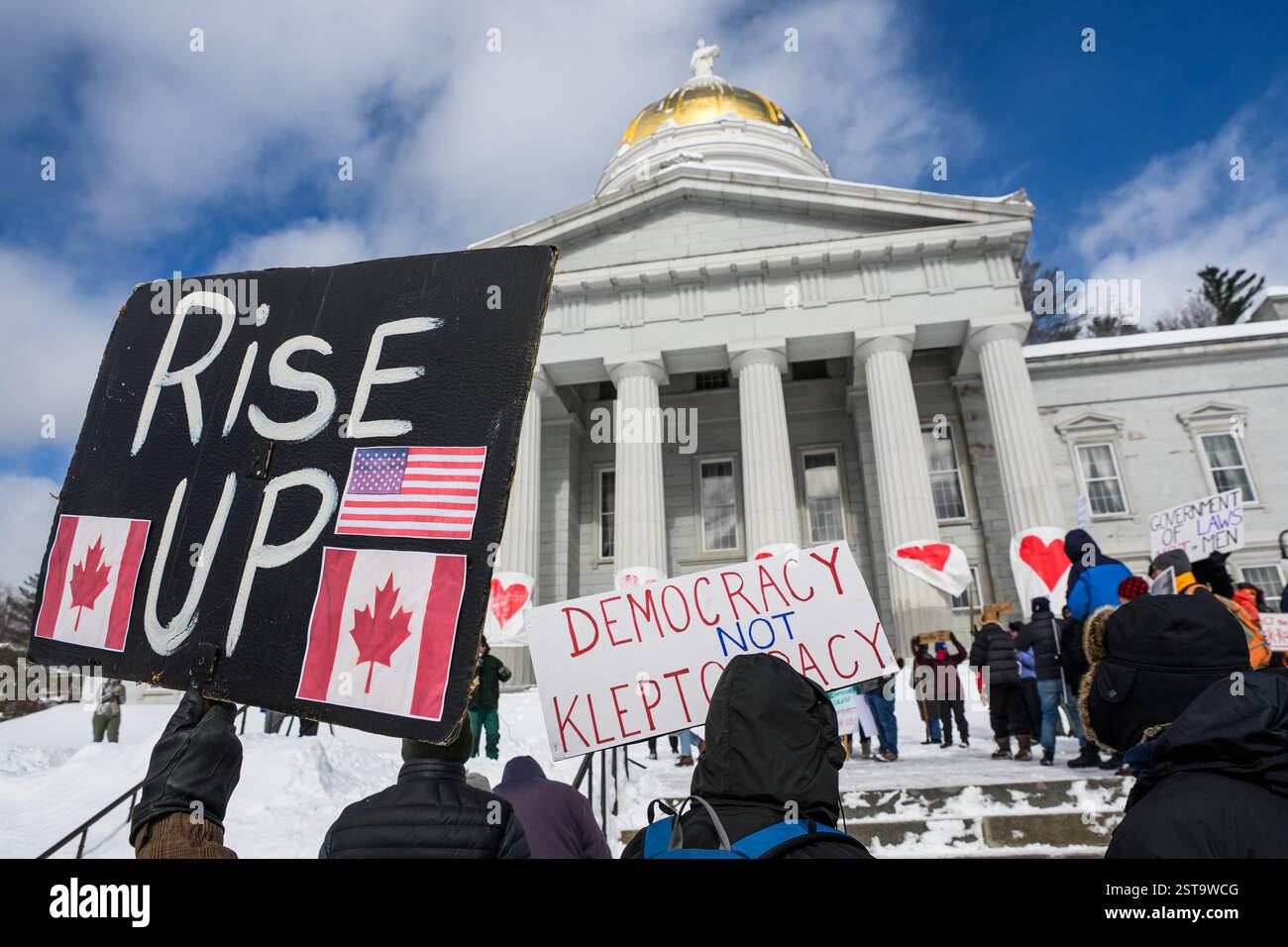 Demonstrators protest Trump administration policies during the Vermont ...