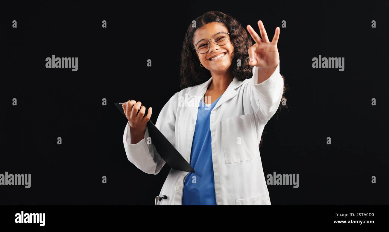 Portrait, child and doctor with okay sign for future career, medical ...