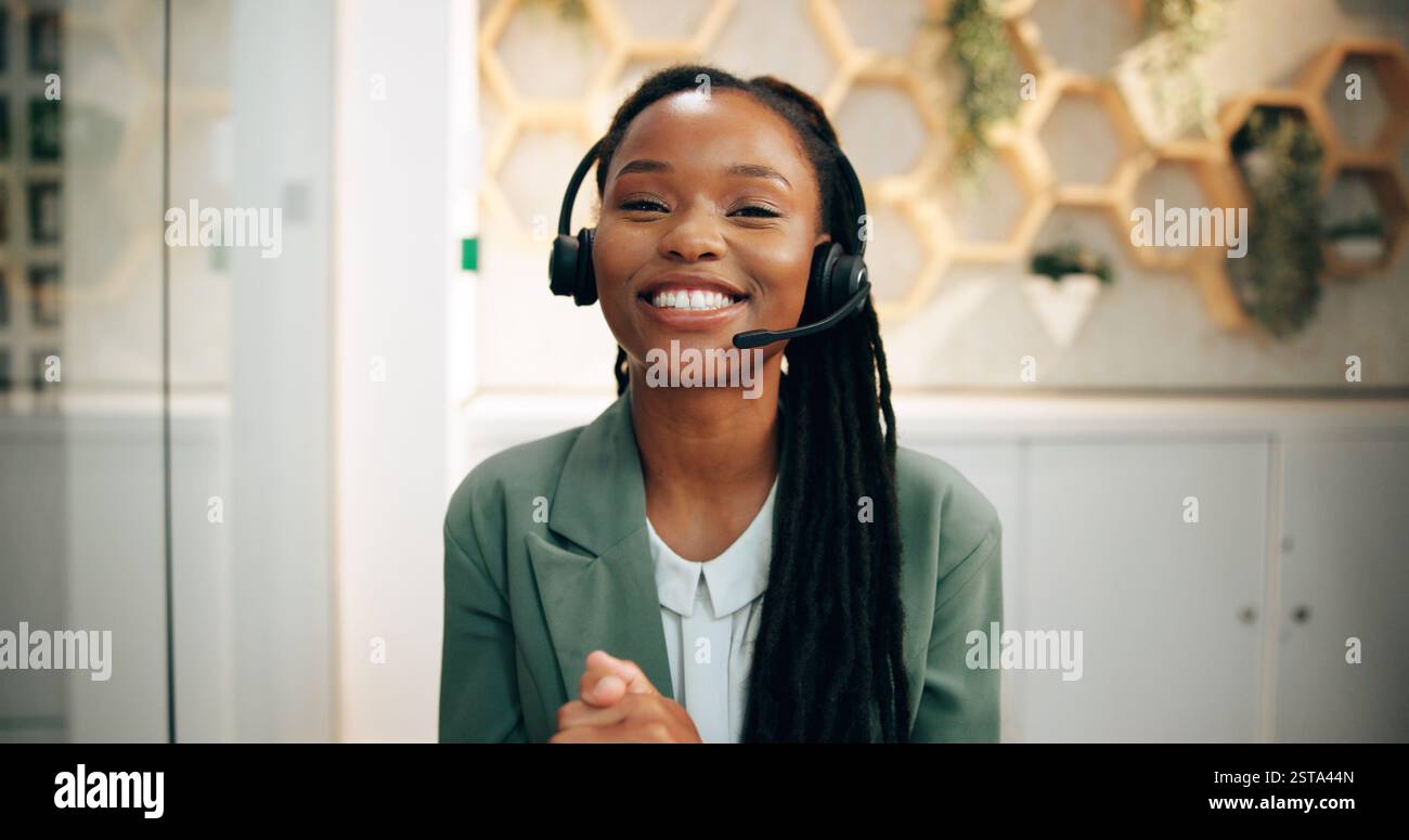 Headset, portrait and smile of black woman concierge at front desk of ...