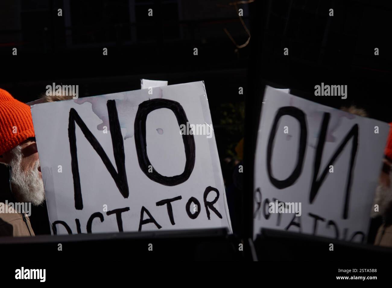 New York, New York, USA. 17th Feb, 2025. A protester holds a sign that ...