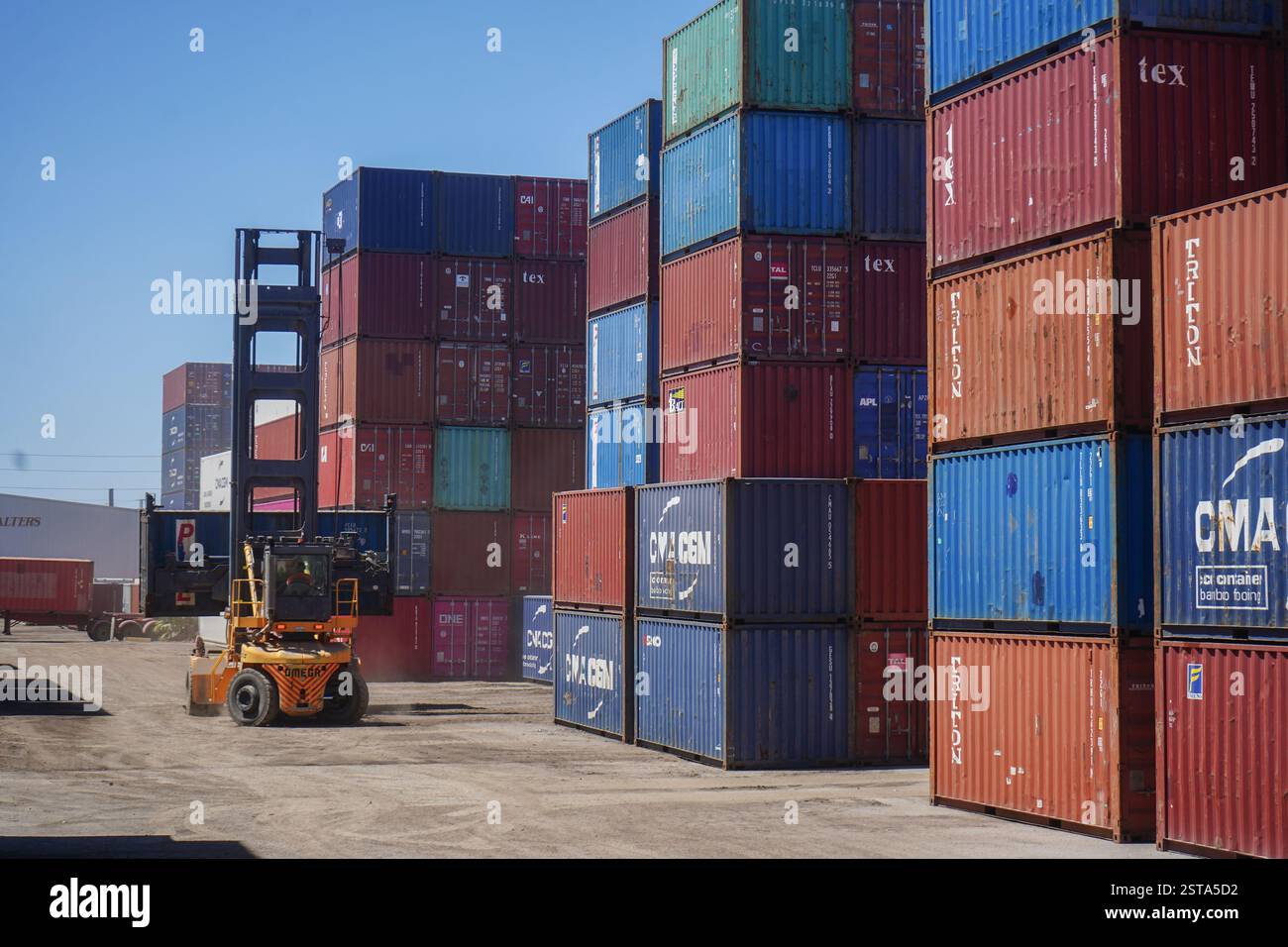 Adelaide, Australia 18 February 2025. A forklift carries container at ...