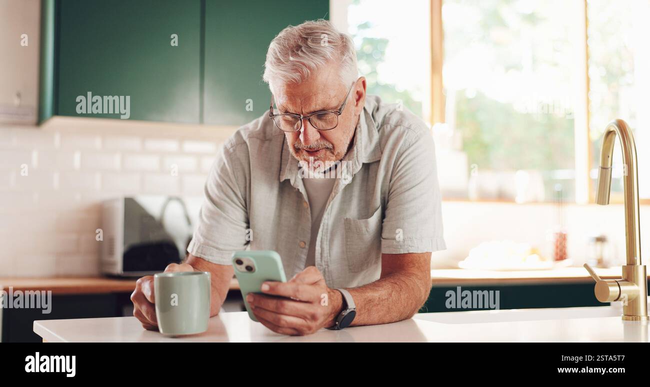 Coffee, phone and reading with old man in kitchen for retirement fund ...