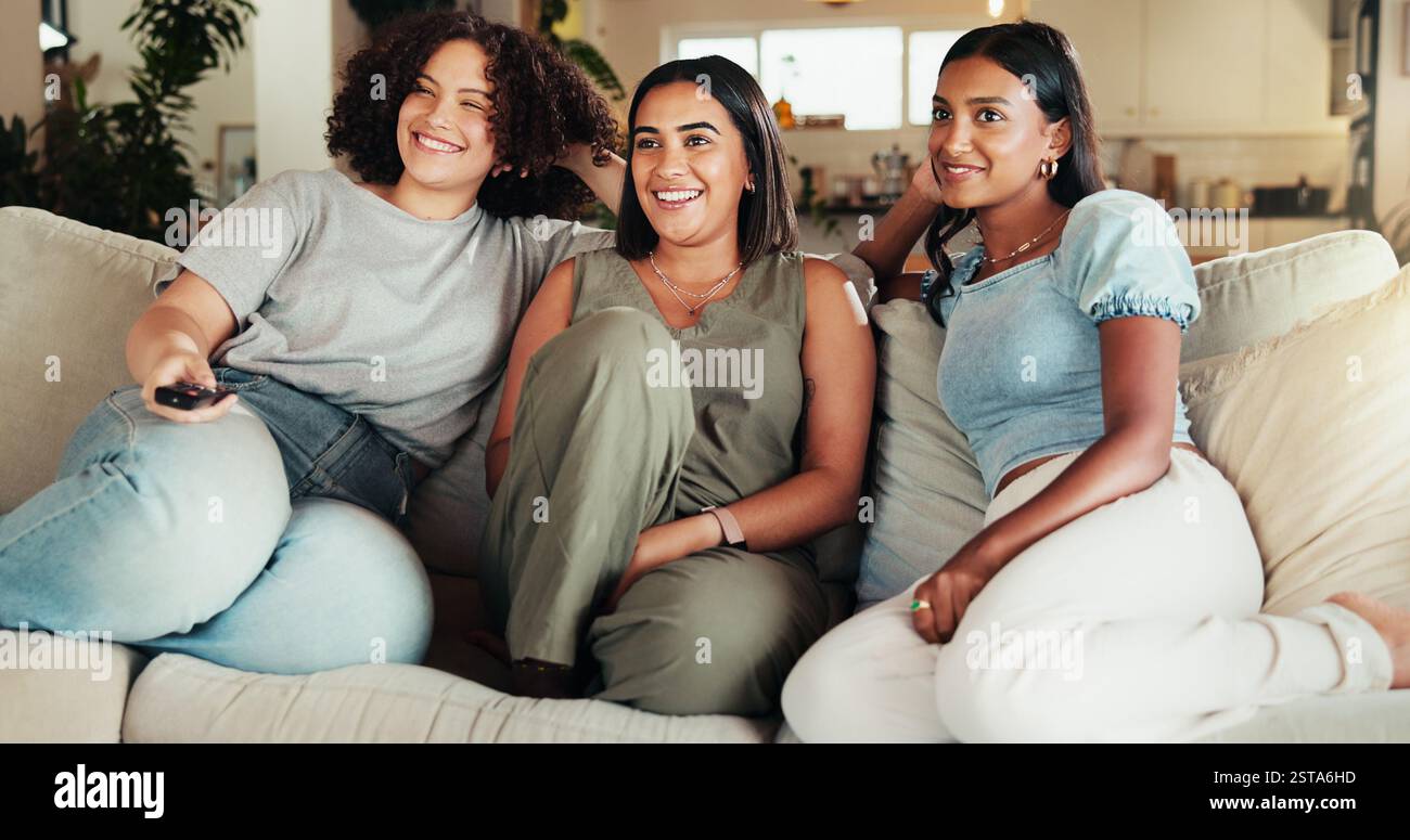 Woman, friends and smile watching tv, movies and bonding in living room ...