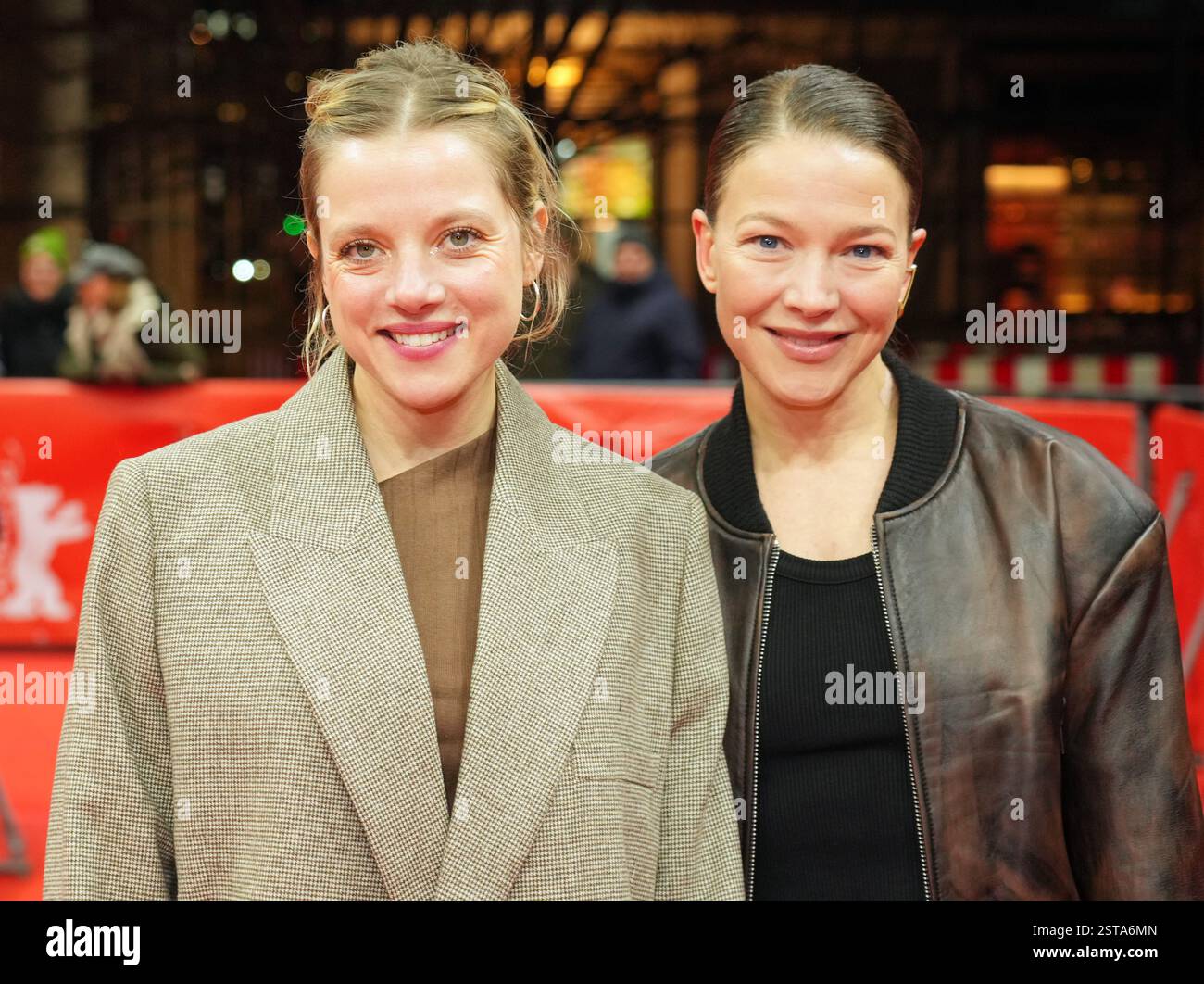Berlin, Germany. 17th Feb, 2025. Actresses Jella Haase (l) and Hannah Herzsprung (r) stand on ...