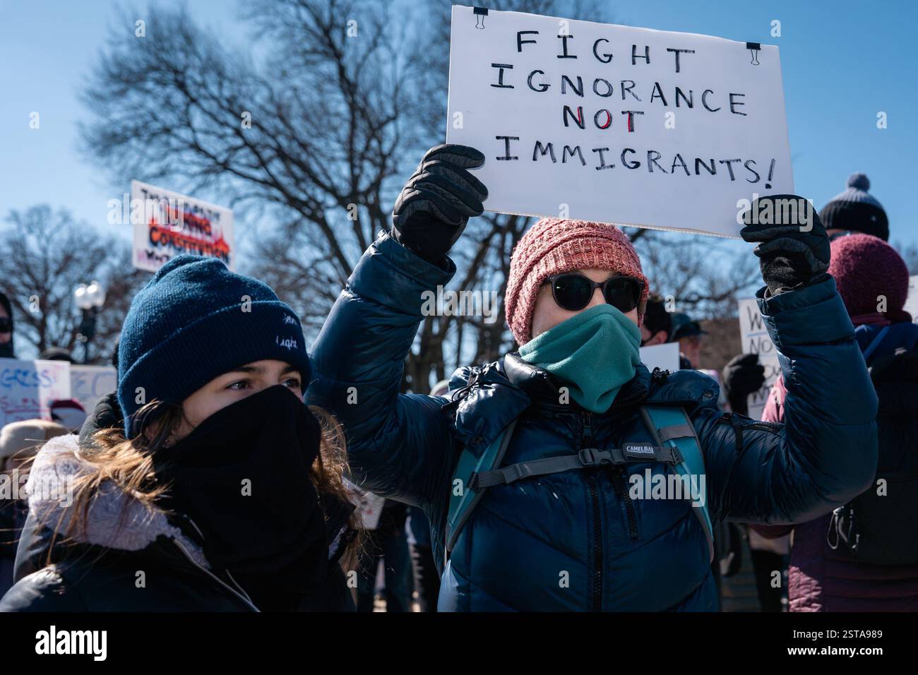 Washington, United States. 17th Feb, 2025. A protestor holds a placard ...