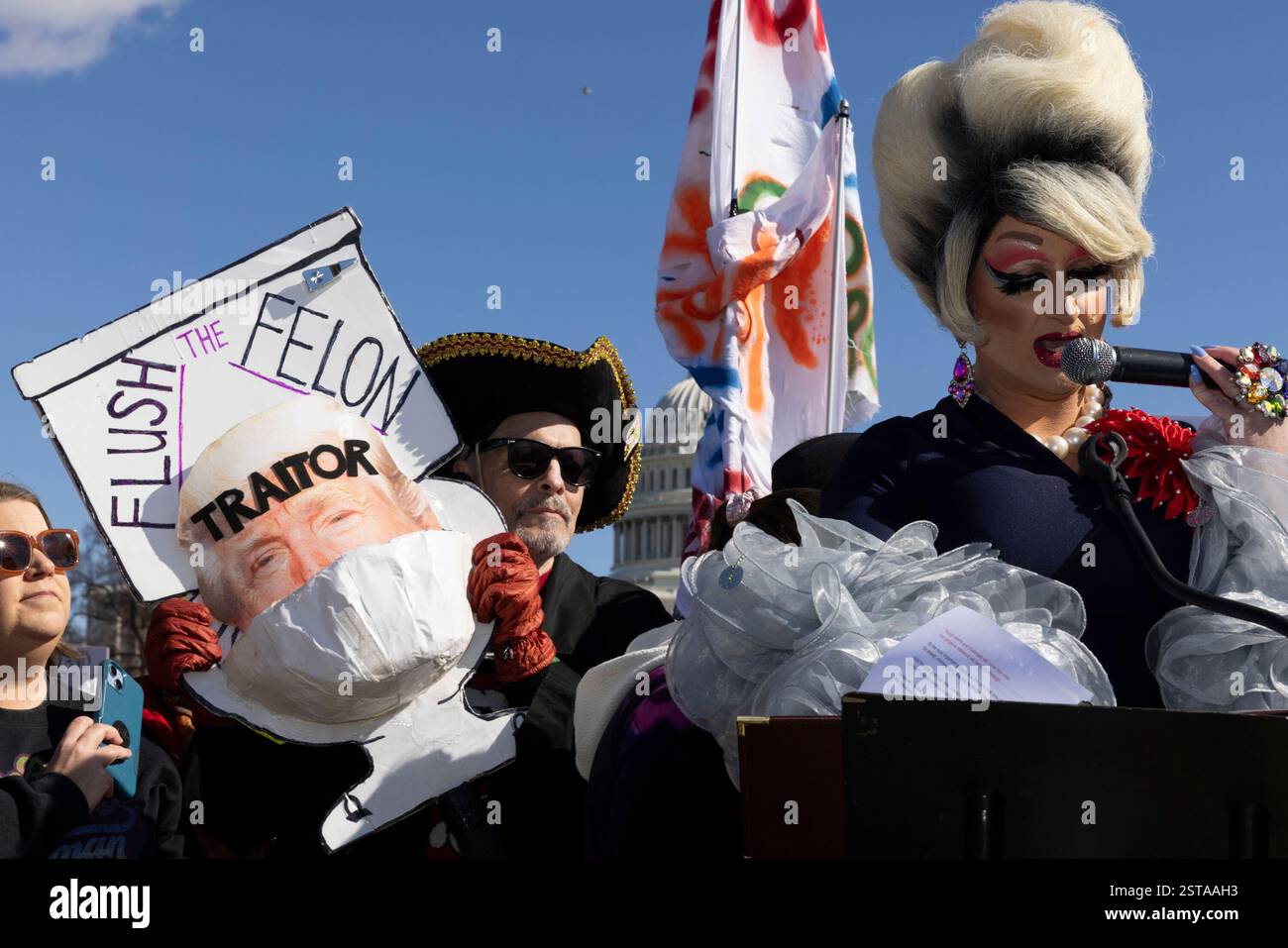 Performer Tara Hoot delivers a speech during the rally against the ...