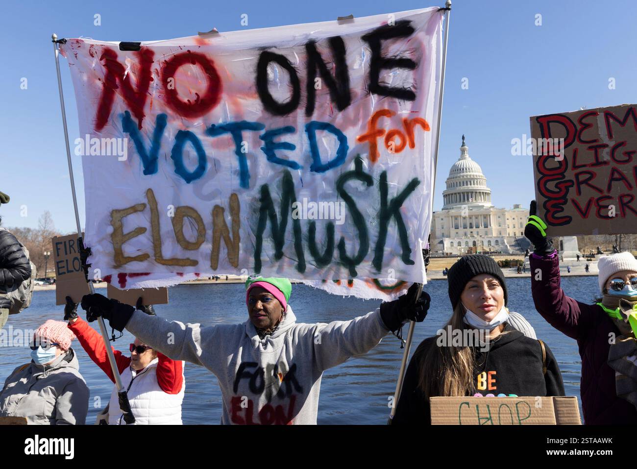 A protester holds a sign during the rally against the Donald Trump ...