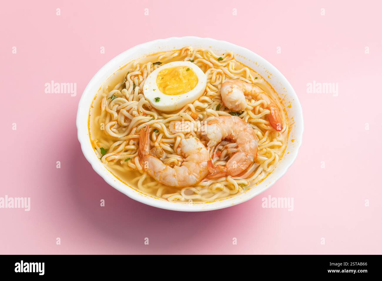 Instant Noodles on a pink background with Shrimps Asian Thai food ...
