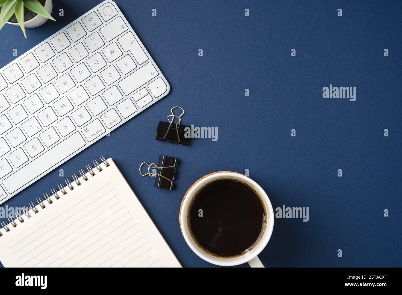 Workspace with keyboard, office supplies, pen and coffee cup. Flat lay ...