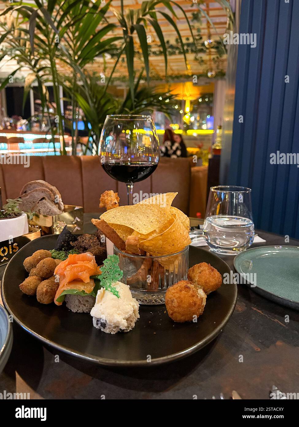 This elegant appetizer platter presents a refined mix of flavors and ...