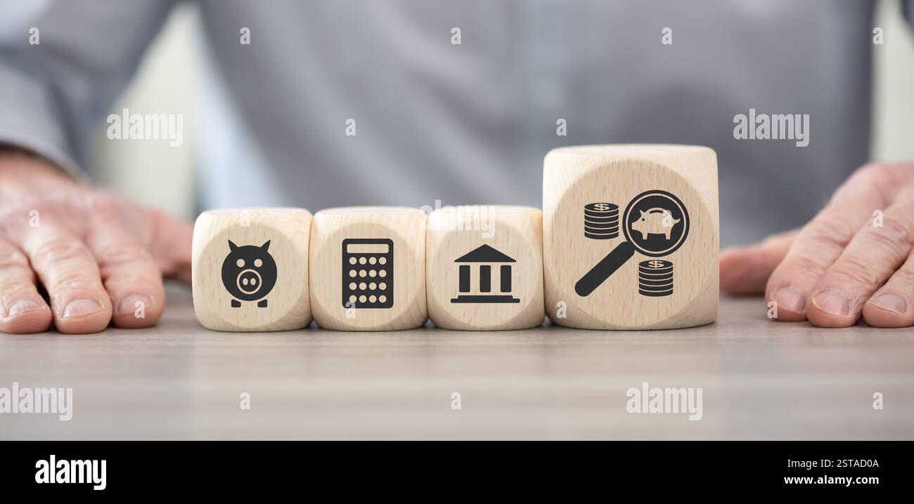Wooden blocks with symbol of money management concept Stock Photo - Alamy