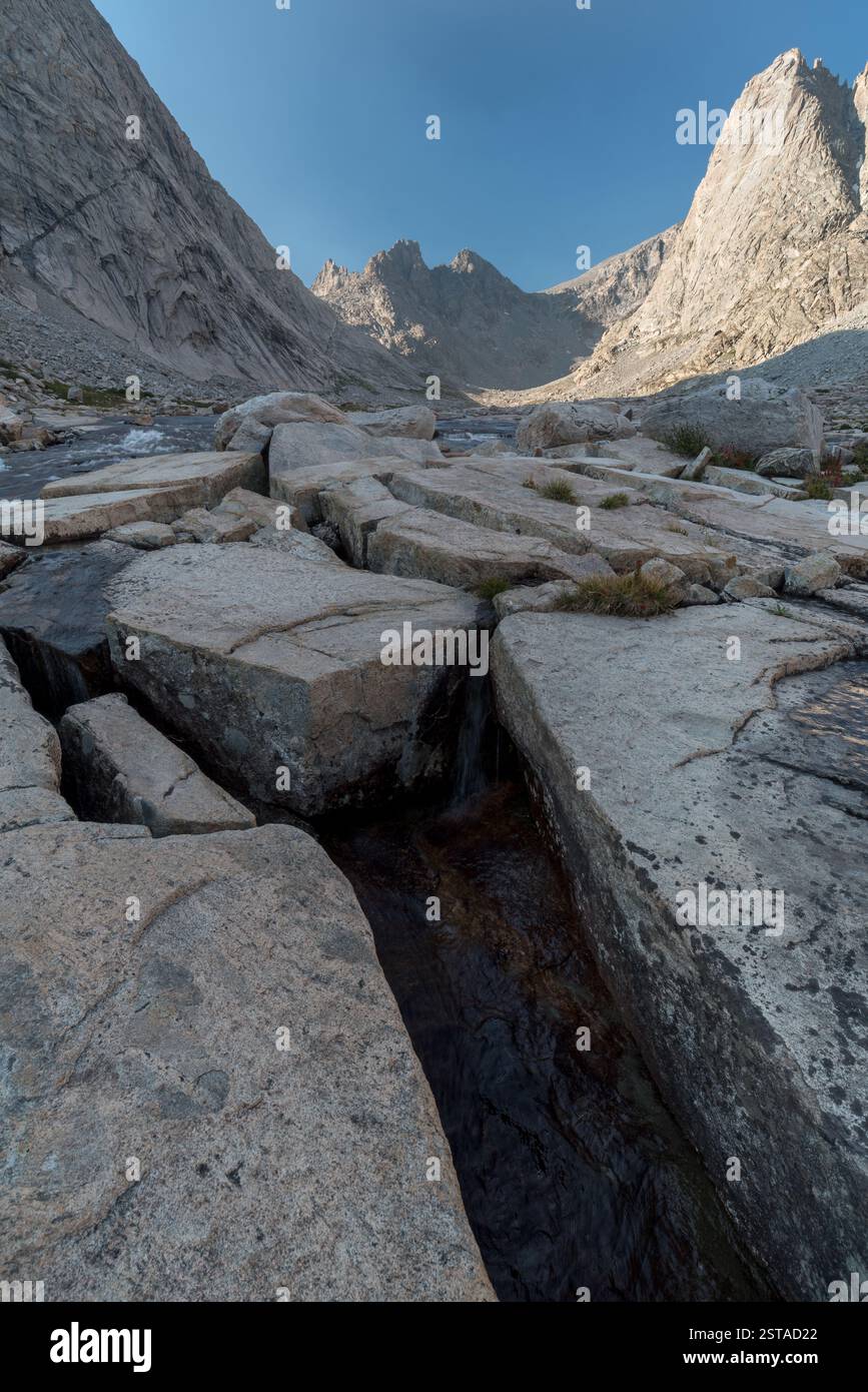 Stream flowing through cracks in bedrock, Wind River Range, Wyoming ...