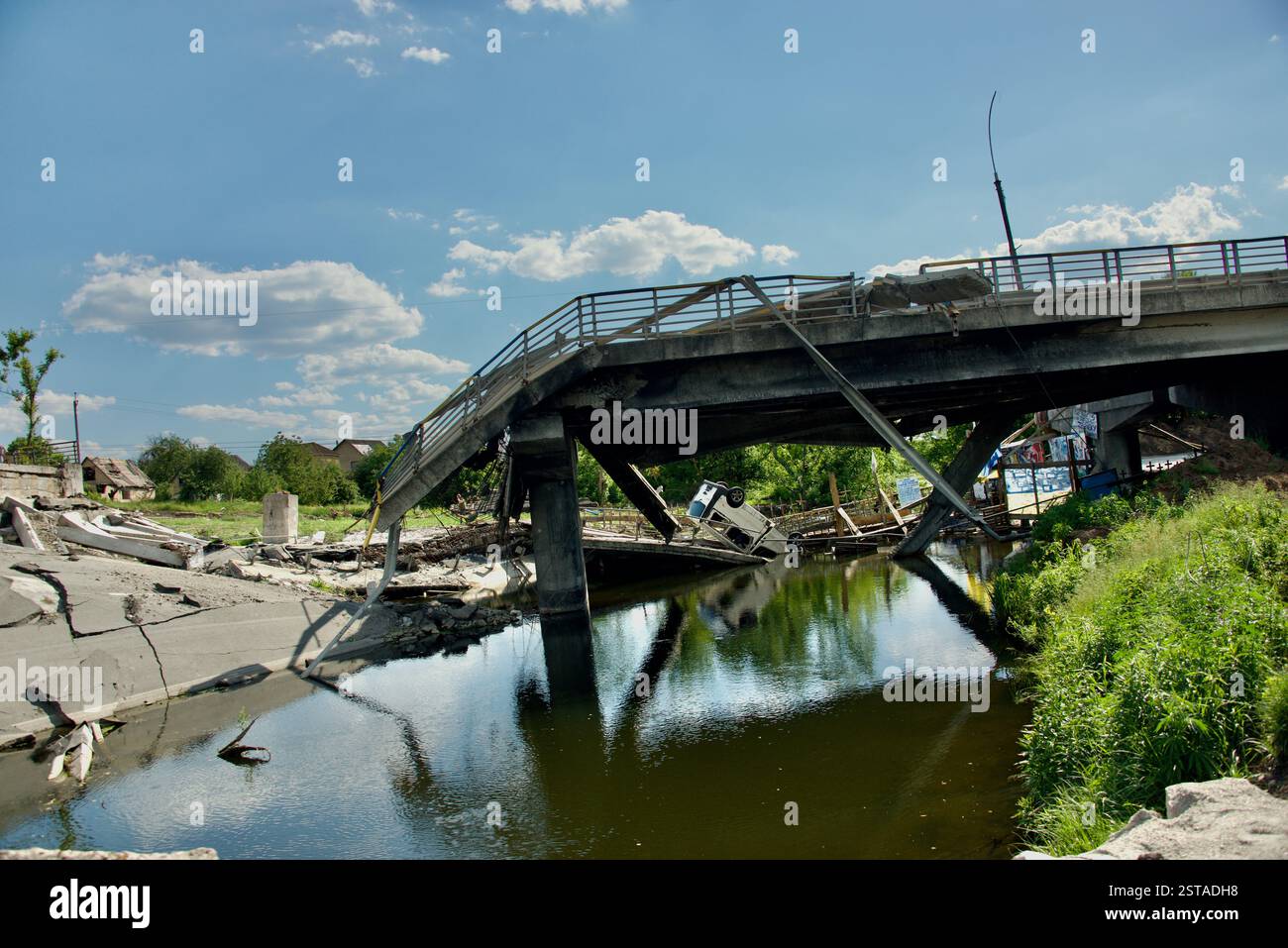 PHOTO SHOWS A BRIDGE THAT HAS BEEN DESTROYED BY RUSSIAN SOLDIERS IN ...