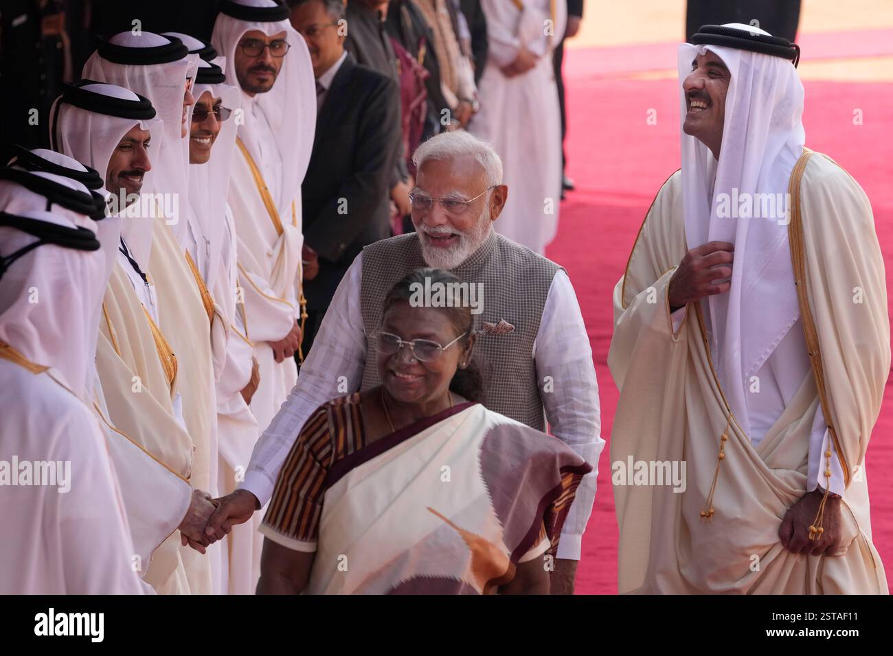 Indian President Droupadi Murmu, front and Indian Prime Minister Narendra Modi, behind meet ...
