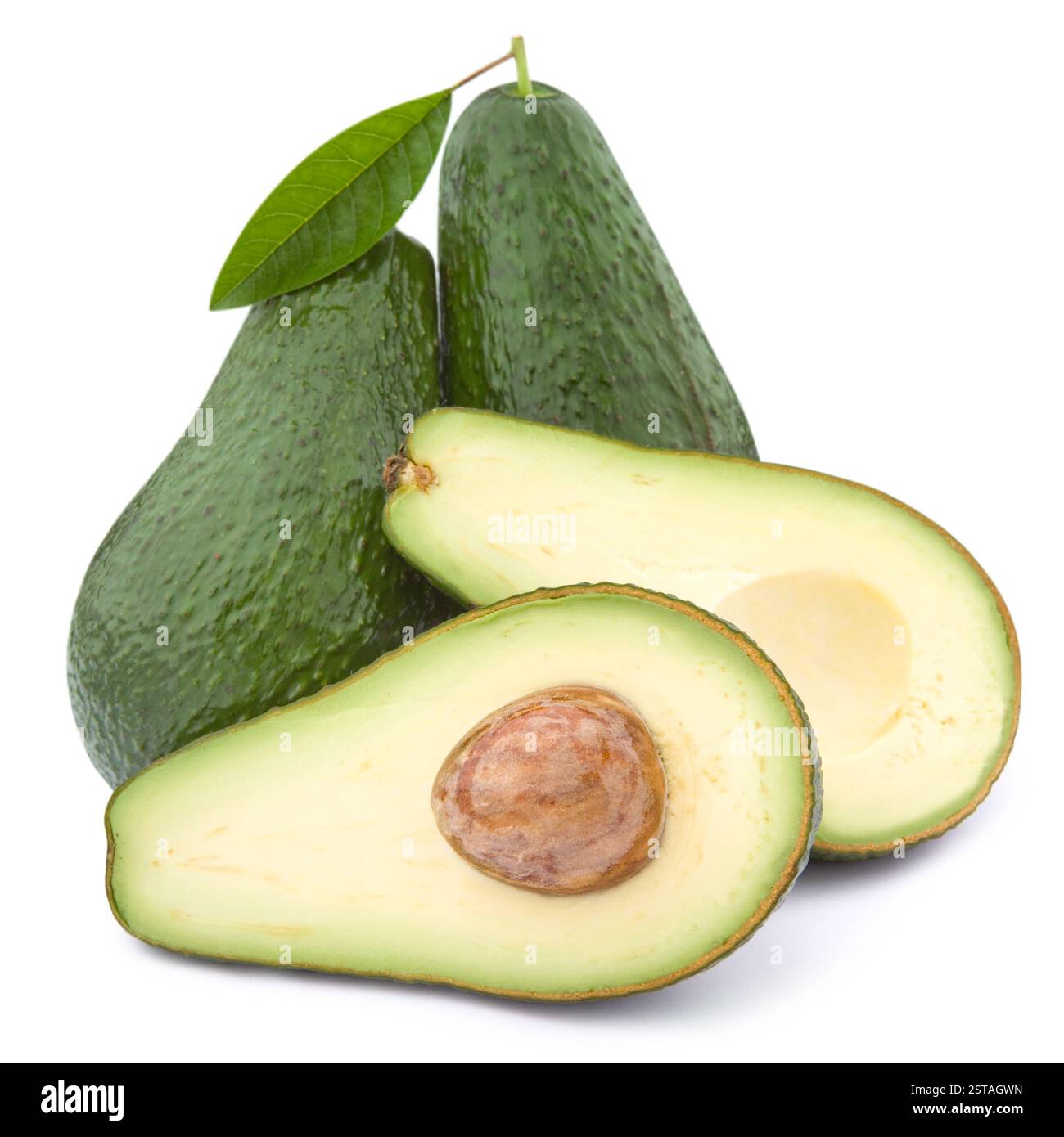 Avocado cut in half isolated on white Stock Photo - Alamy