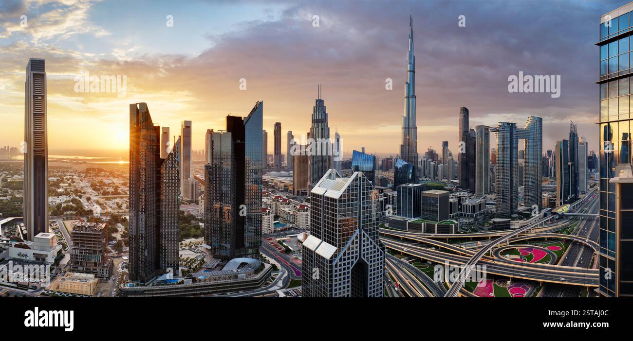 Dubai skyline at sunset with Burj Khalifa - aerial view, United Arab ...