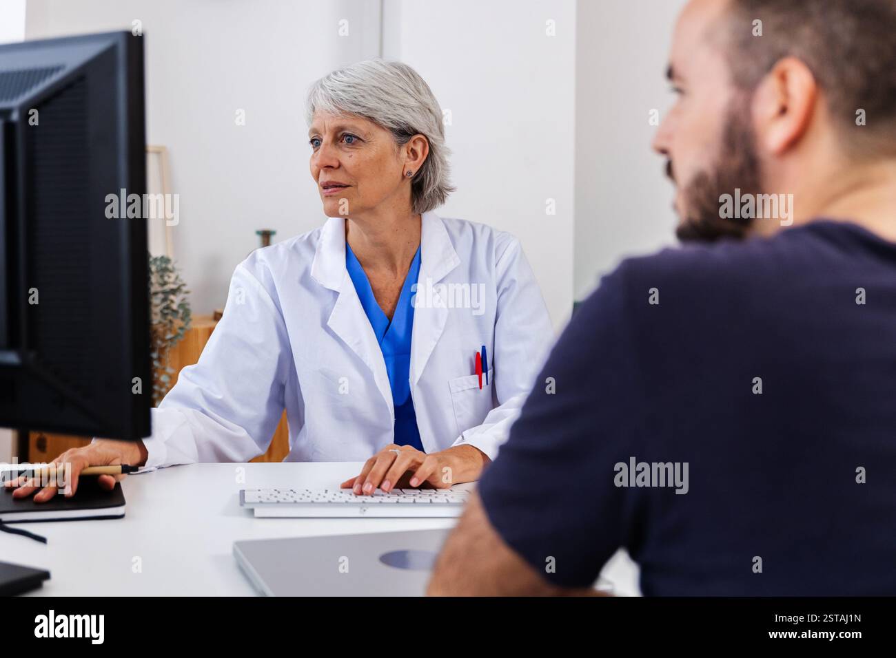 Female doctor explaining medication middle hi-res stock photography and ...