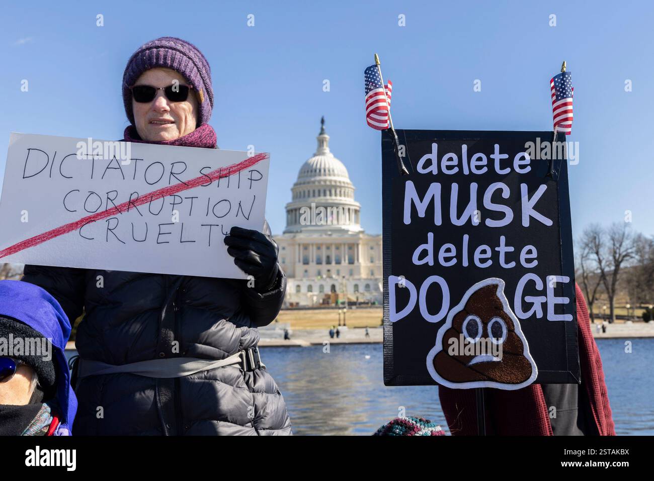 Washington Dc, United States. 17th Feb, 2025. Protesters hold signs ...