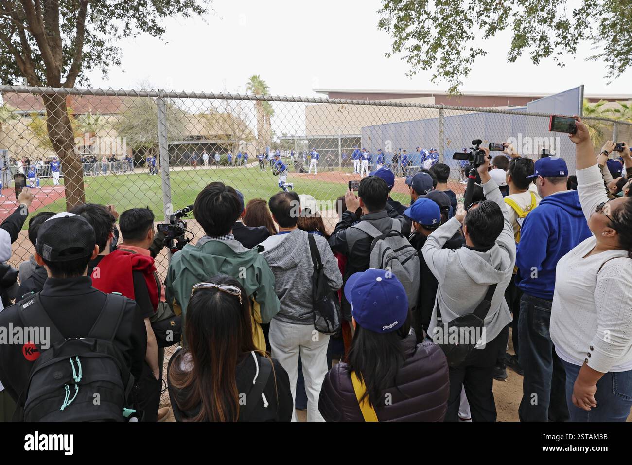 Fans gather at the Los Angeles Dodgers' spring training site in ...