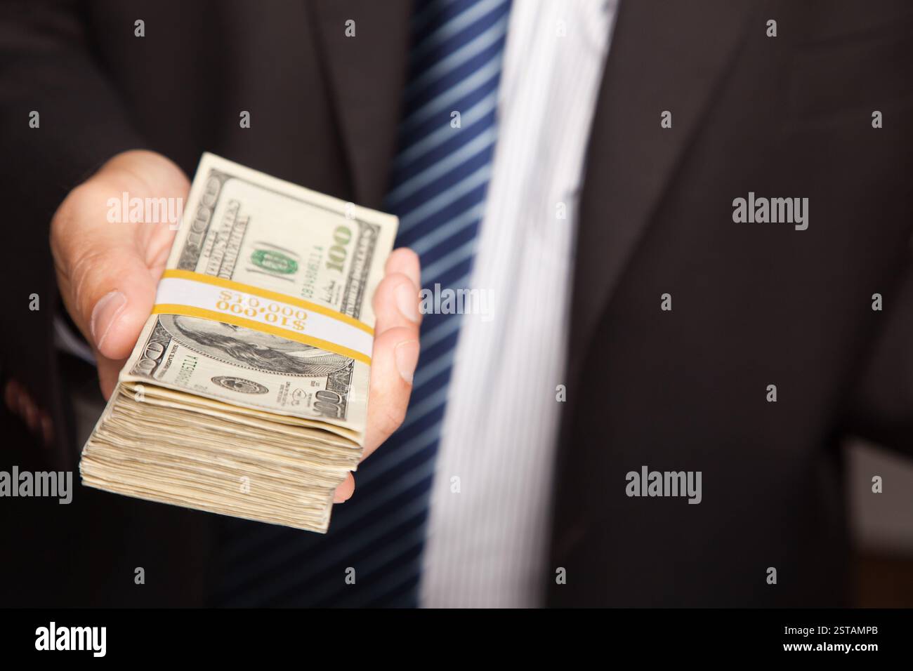 Rich businessman over pile hi-res stock photography and images - Alamy