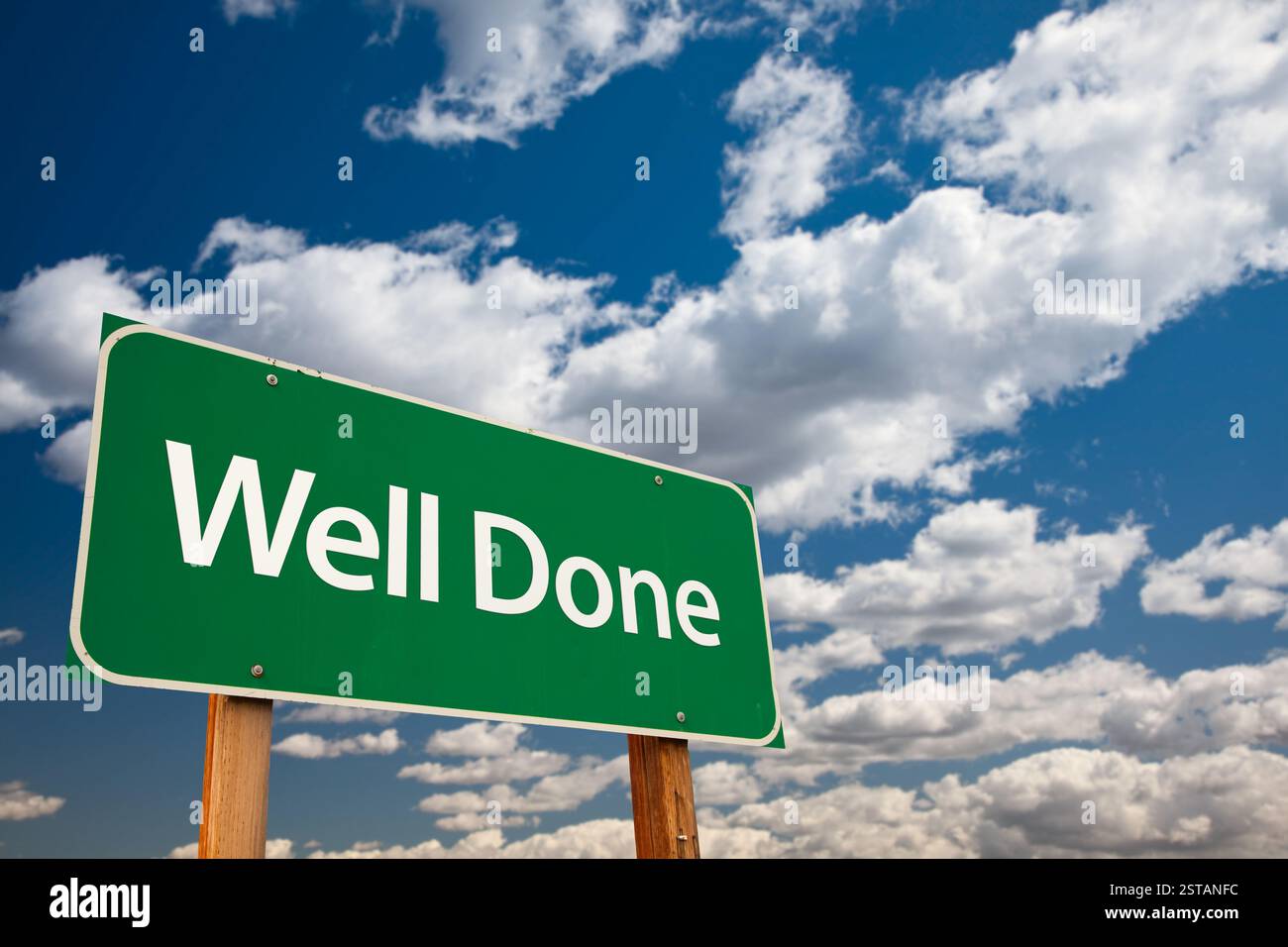 Well Done Green Road Sign with Dramatic Clouds and Sky - The Kudos Sign ...