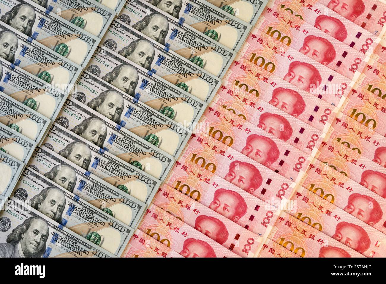 Chinese currency yuan and U.S. dollars amerkinaische bills. The concept ...