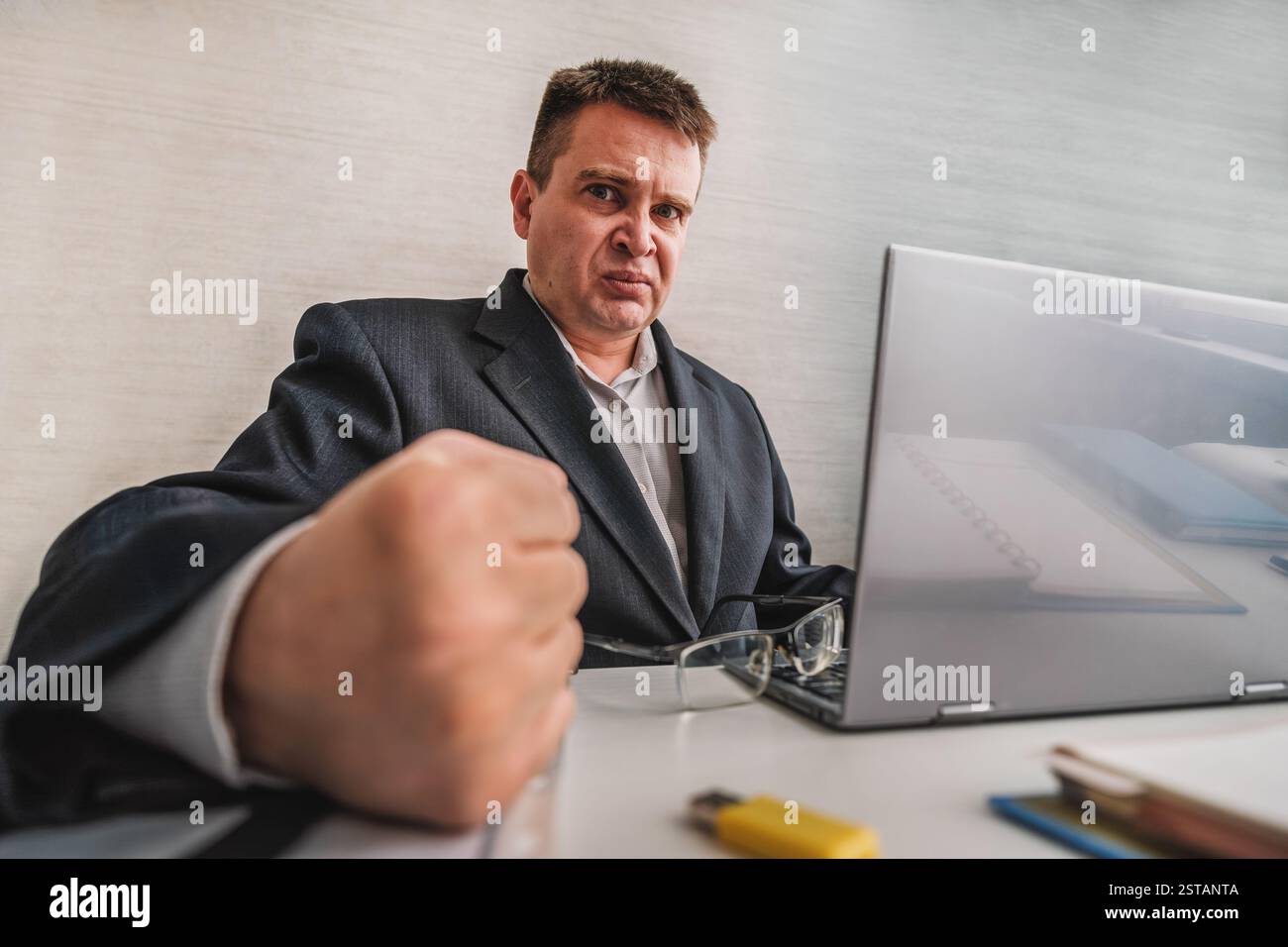 Angry strict boss hits the table with his fist. Concept of anger. angry ...
