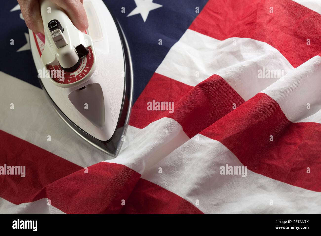 Ironing Out the Wrinkles in the American Flag Concept Stock Photo - Alamy