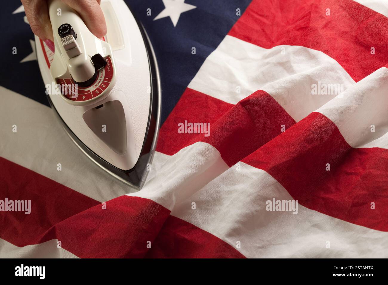 Ironing Out the Wrinkles in the American Flag - Conceptual Stock Photo ...