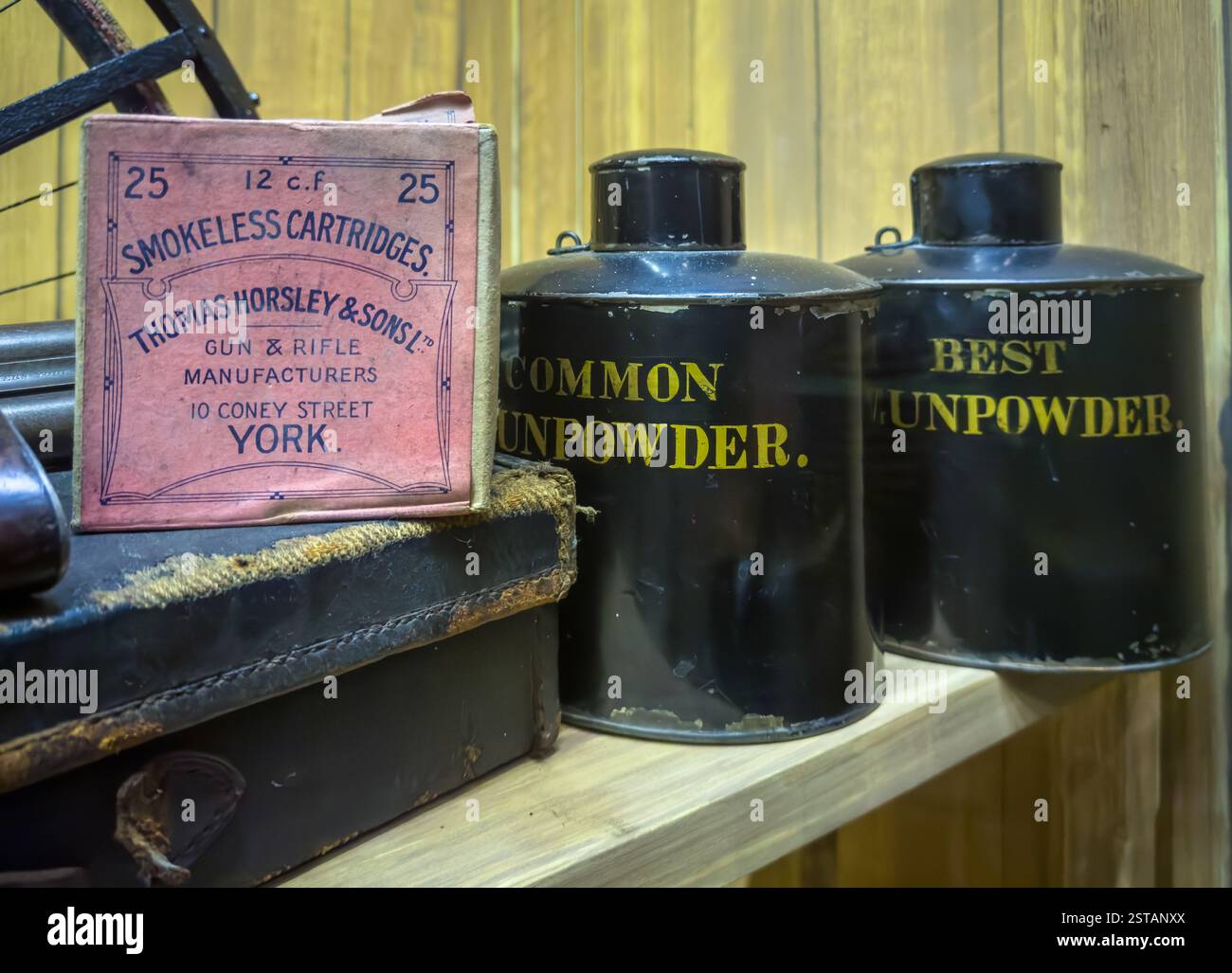 Old tins of gunpower and a box of smokeless cartridges exhibts on ...