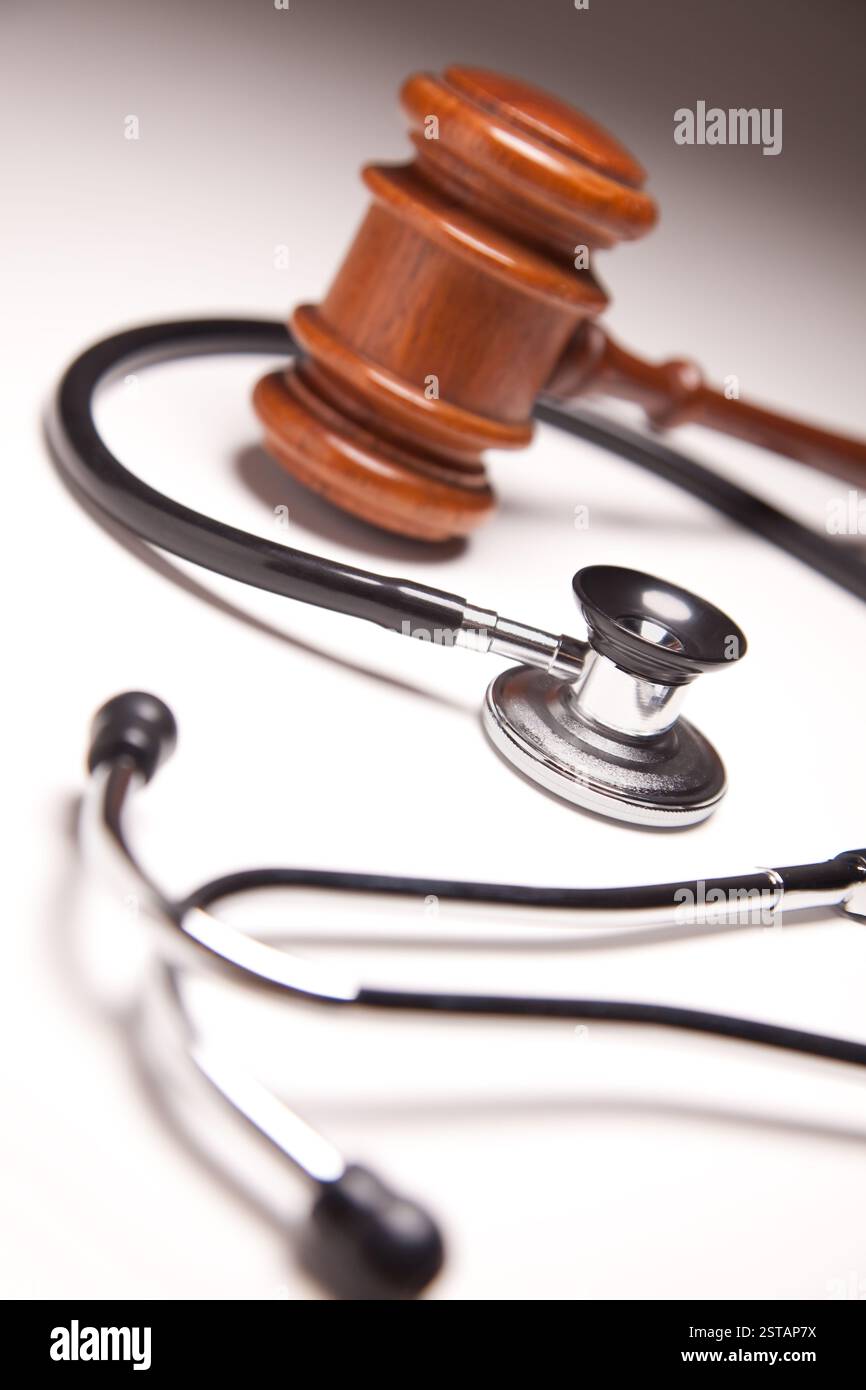 Gavel and Stethoscope on Gradated Background with Selective Focus Stock ...
