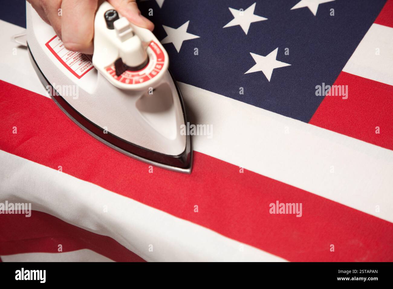Ironing Out the Wrinkles in the American Flag - Conceptual Stock Photo ...