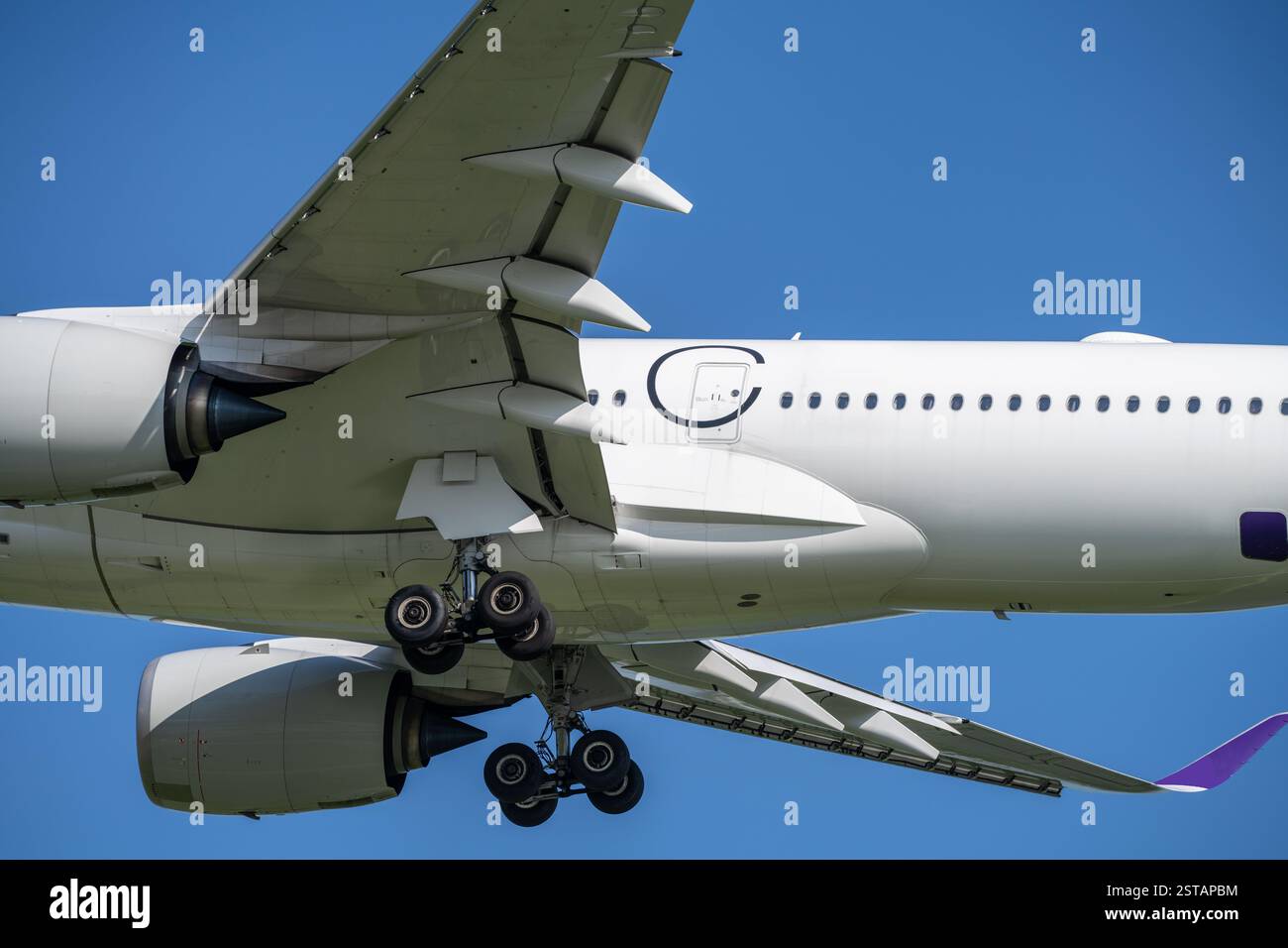 Engineering view of commercial aircraft underbelly reveals landing gear ...