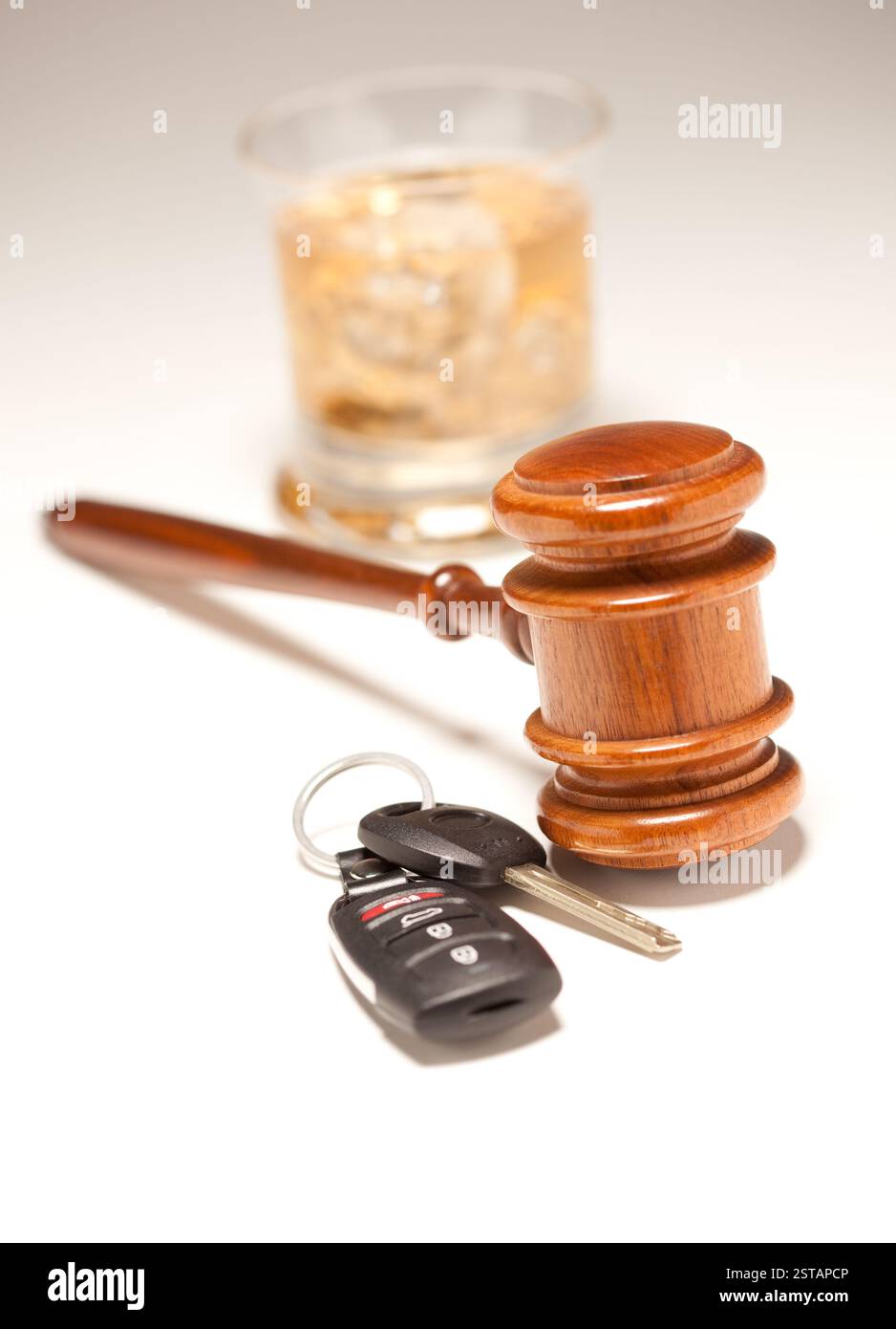 Gavel, Alcoholic Drink & Car Keys on a Gradating to White Background ...