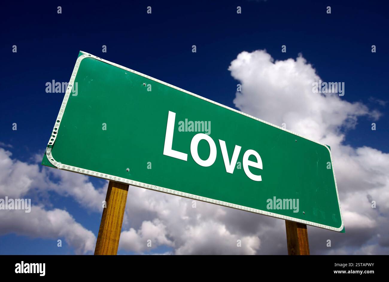 Love Road Sign with Dramatic Clouds and Sky Stock Photo - Alamy
