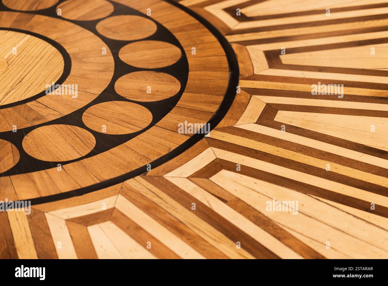 Artistic geometric patterns are meticulously crafted onto a decorative ...